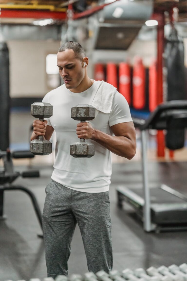 How to do Dumbbell Thusters - Strengthguides.com