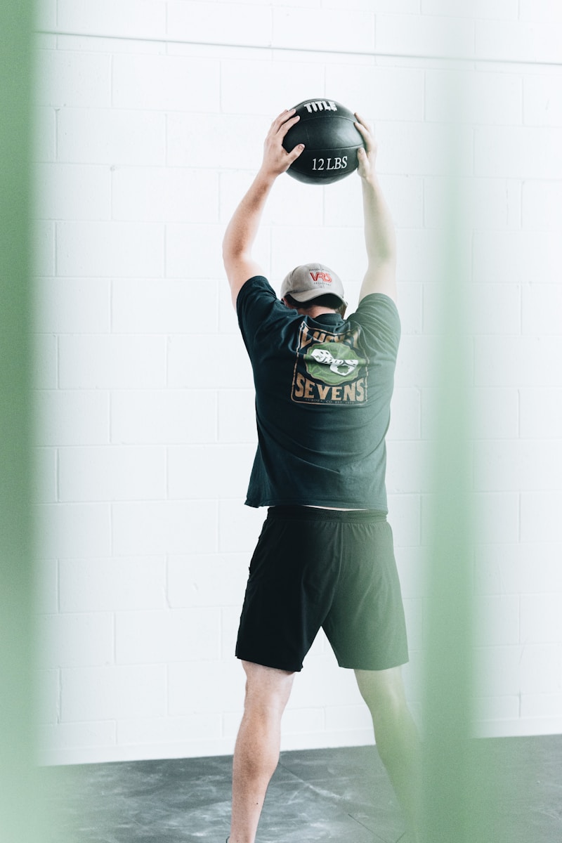 Wall ball exercise guide - Strengthguides.com