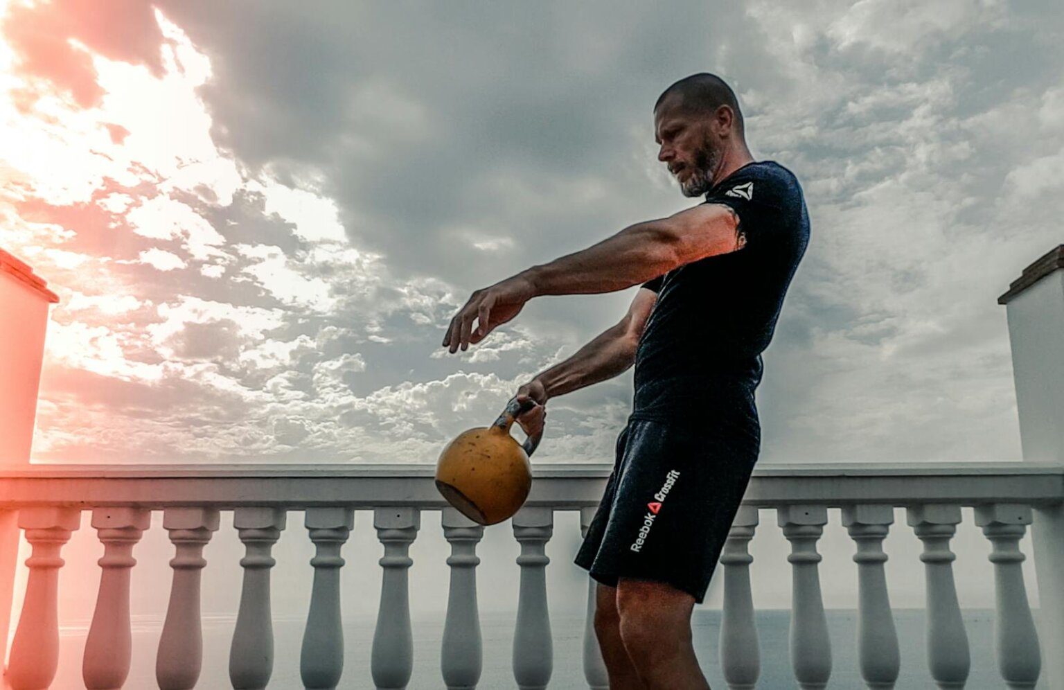 How to Do Kettlebell Windmills - Strengthguides.com
